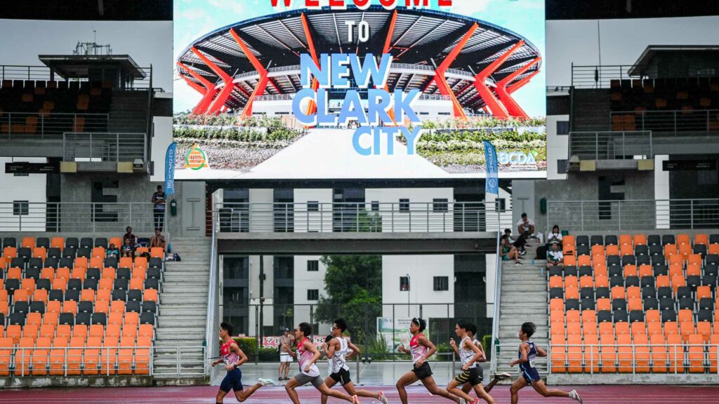 New Clark City lights up again as UAAP Swimming, Athletics ...